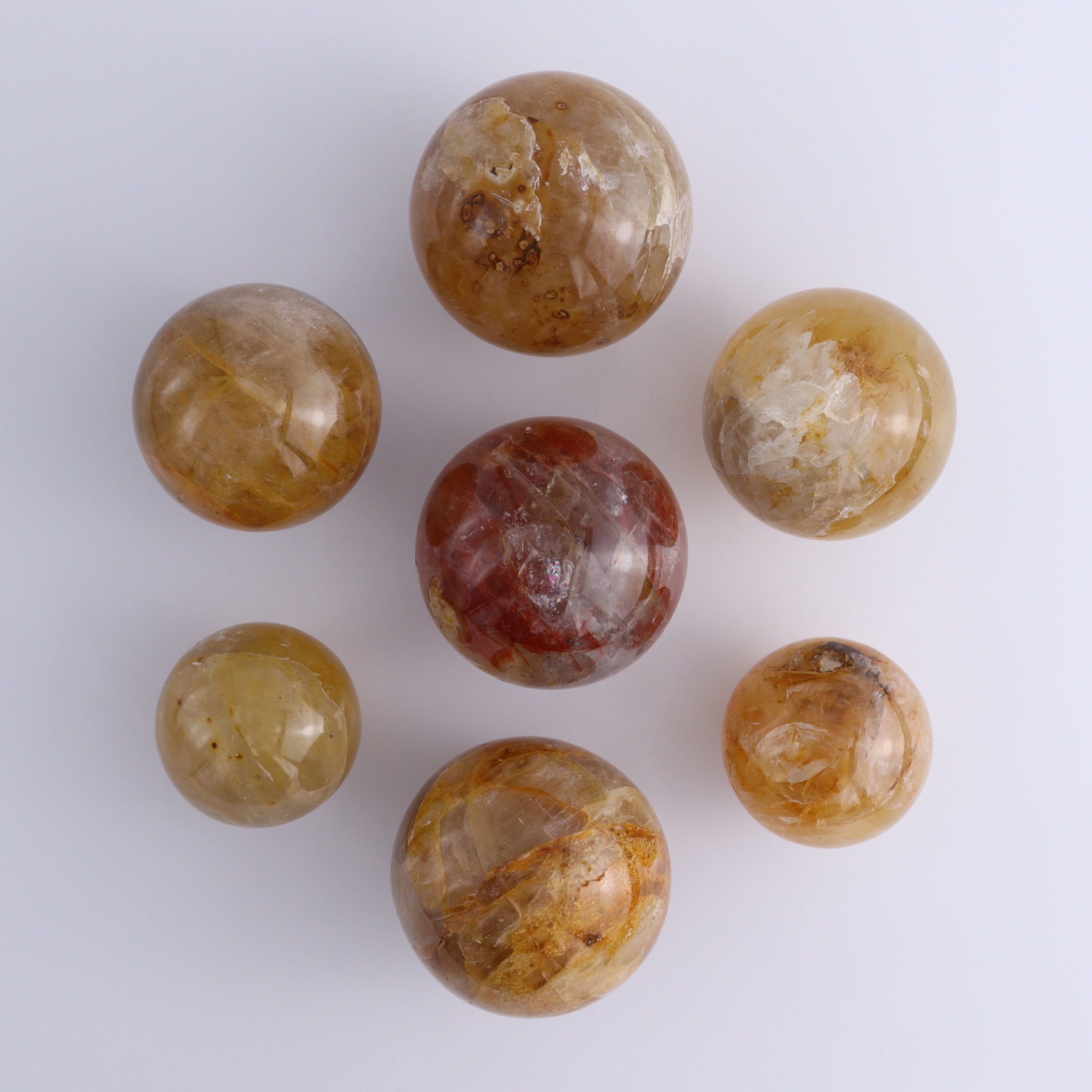 Fire Quartz Spheres Set of 7 – Mi Esperanza Minerals