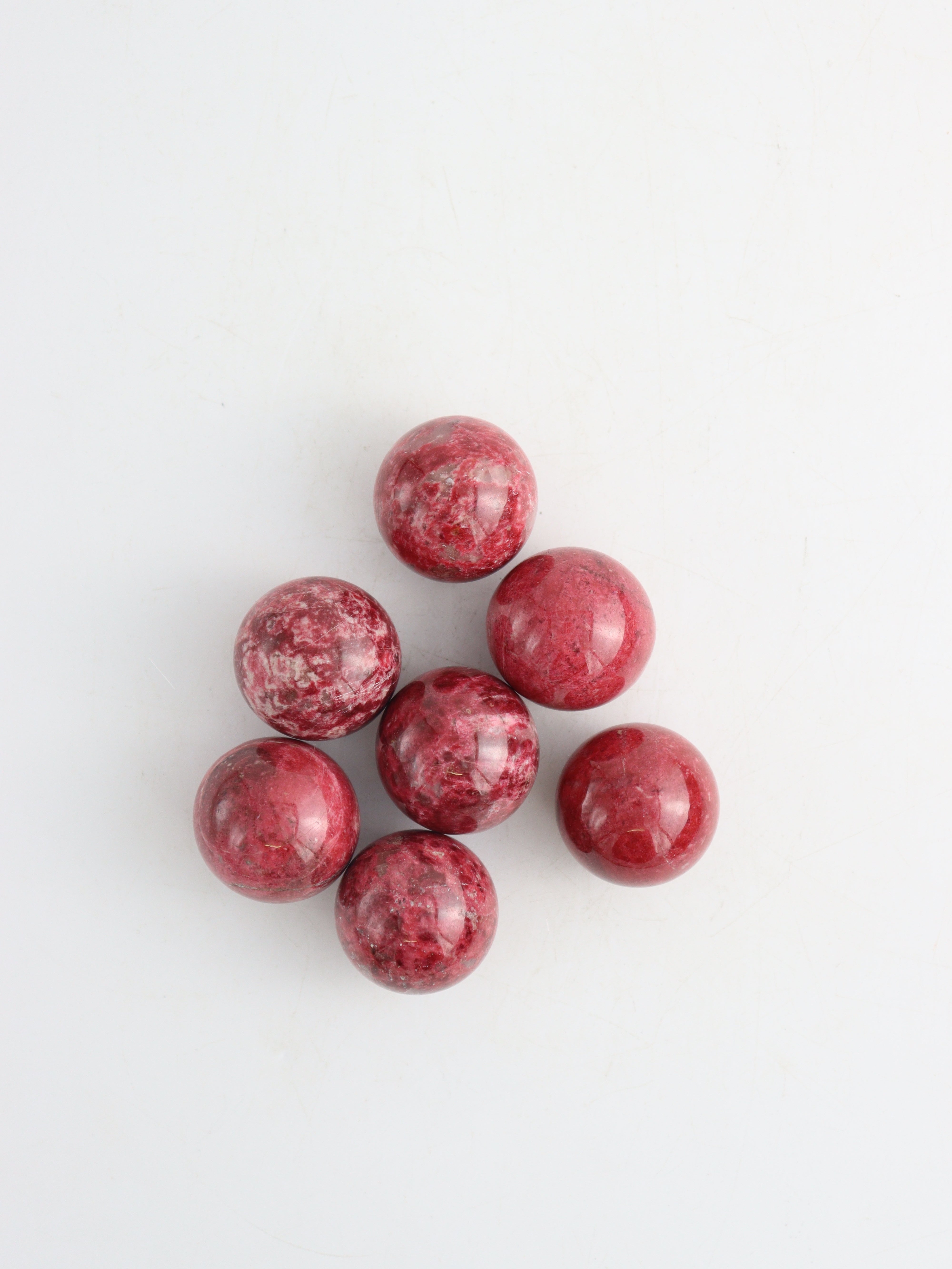 One Thulite Sphere | Wholesale Crystals Vendor – Mi Esperanza Minerals