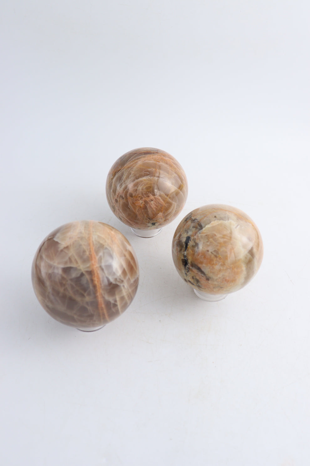 Wholesale Peach Moonstone Spheres – Mi Esperanza Minerals